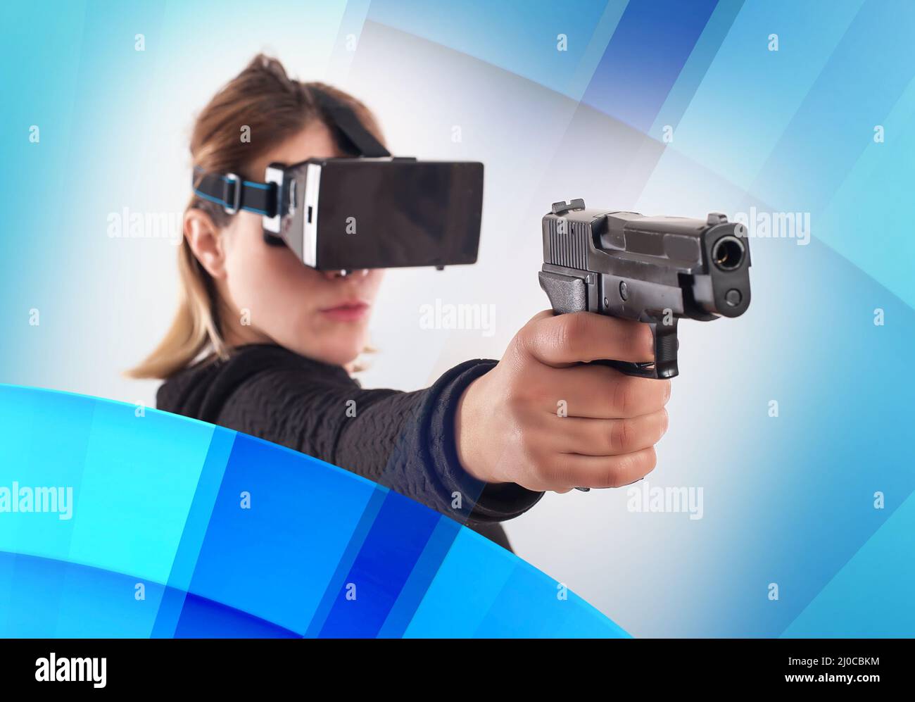 Woman play VR shooter game with virtual reality gun and vr glasses ...