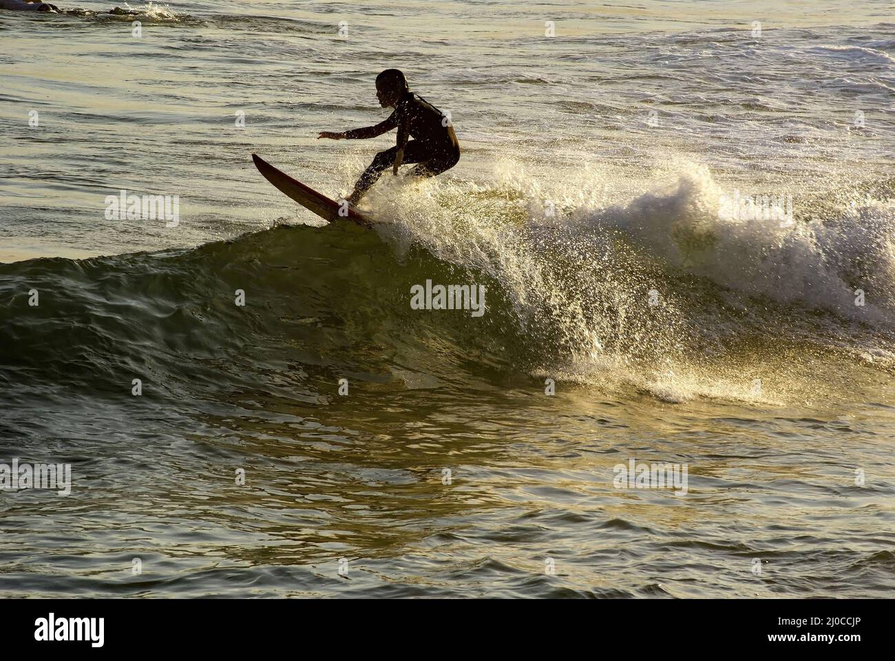 Surf on Arpoador beach Stock Photo - Alamy