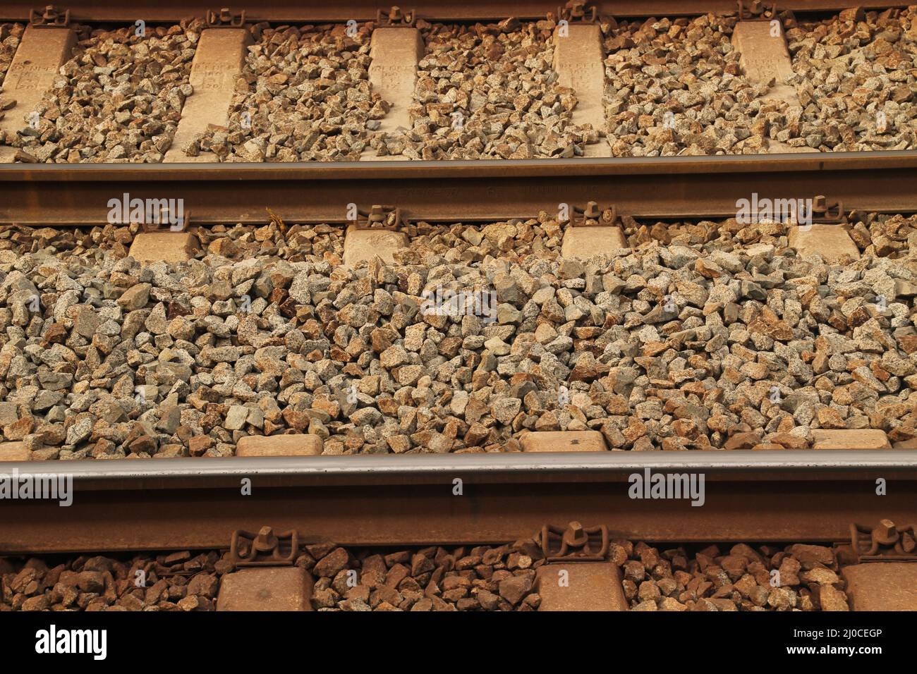 Photo of rail way with rocks Stock Photo - Alamy