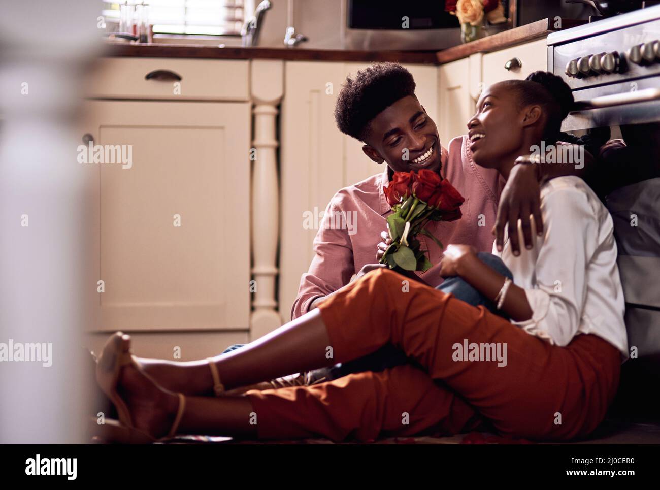 Romantic young man giving rose hi-res stock photography and images - Alamy