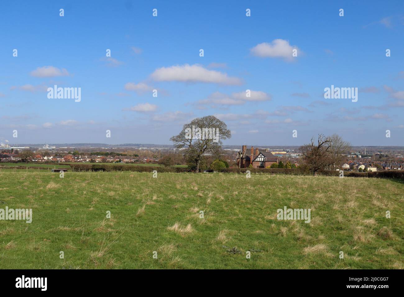 View across an open field, Hawarden, North Wales Stock Photo - Alamy