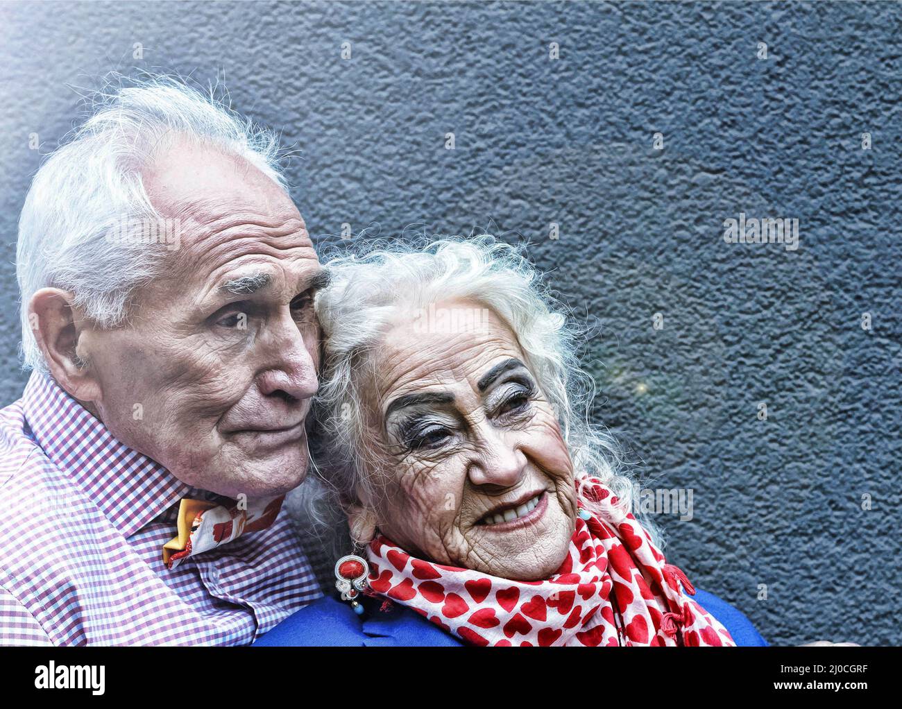 Older people, a married couple in elegant clothes and a festive ...