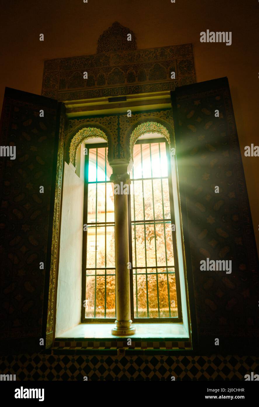 Shot of light coming out from a window with classic old style Stock ...
