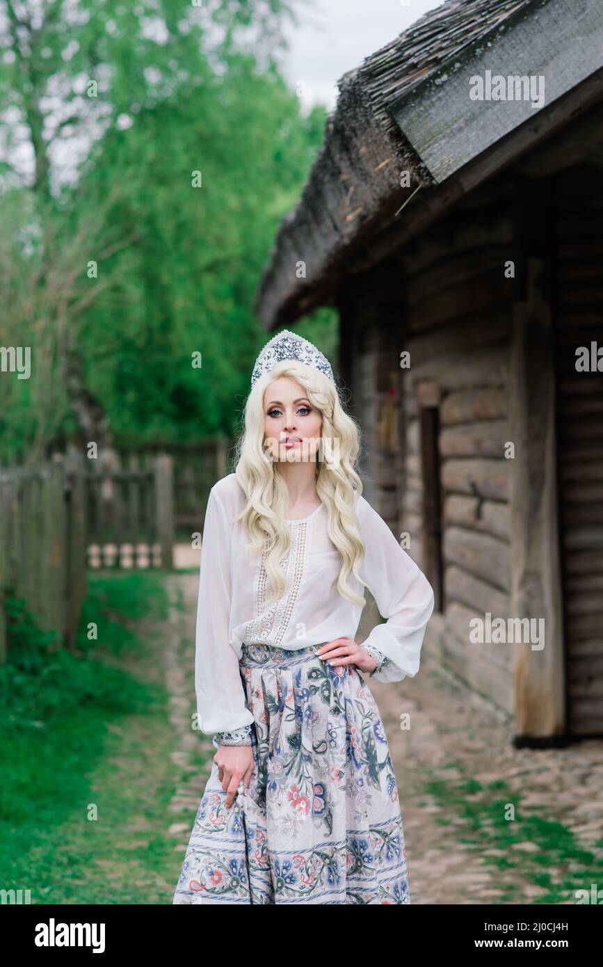 Young female of Slavic appearance with crown, kokoshnik on the ...