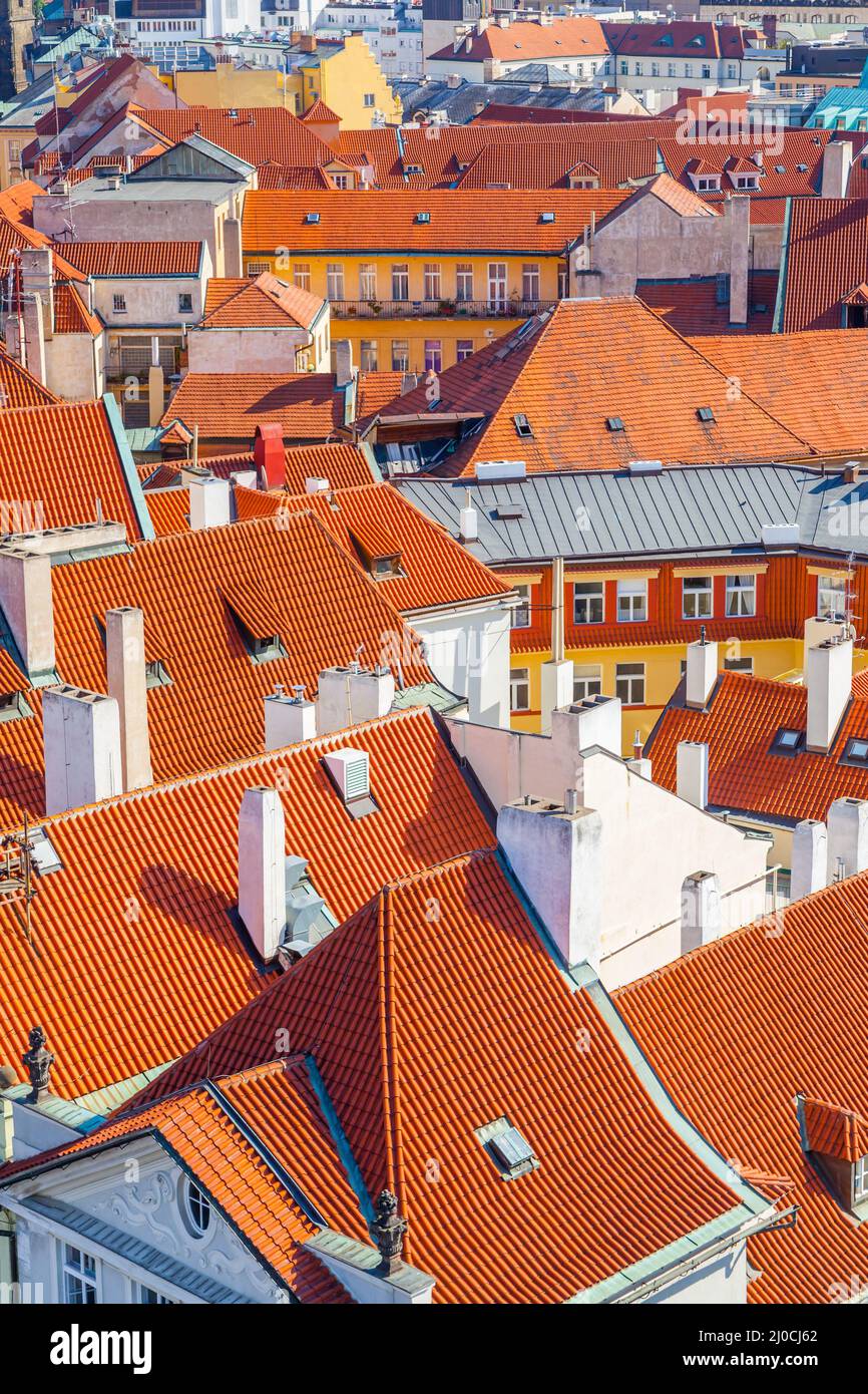 Tiled roofs with chimneys in the Old Town of Prague, Czechia Stock ...