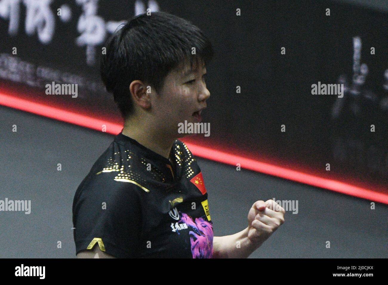 Singapore. 18th Mar, 2022. Sun Yingsha of China reacts during the women ...