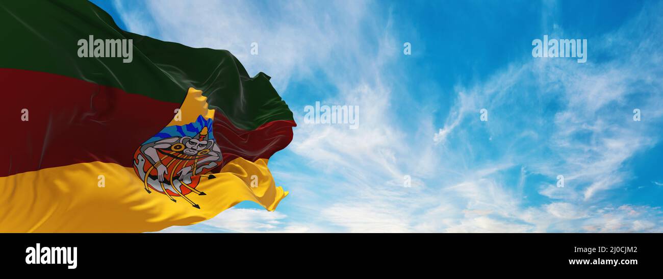 flag of Ayuuk Nation , Mexico at cloudy sky background on sunset ...