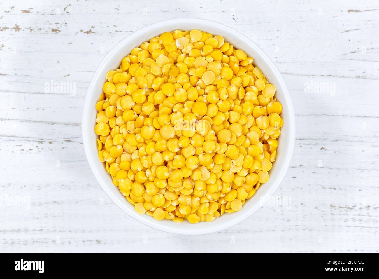 Yellow lentils in wooden hi-res stock photography and images - Alamy