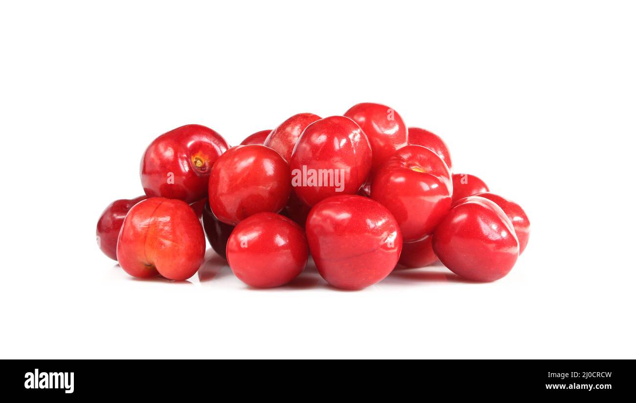 Pile of organic homegrown cherries with no stem isolated on white ...