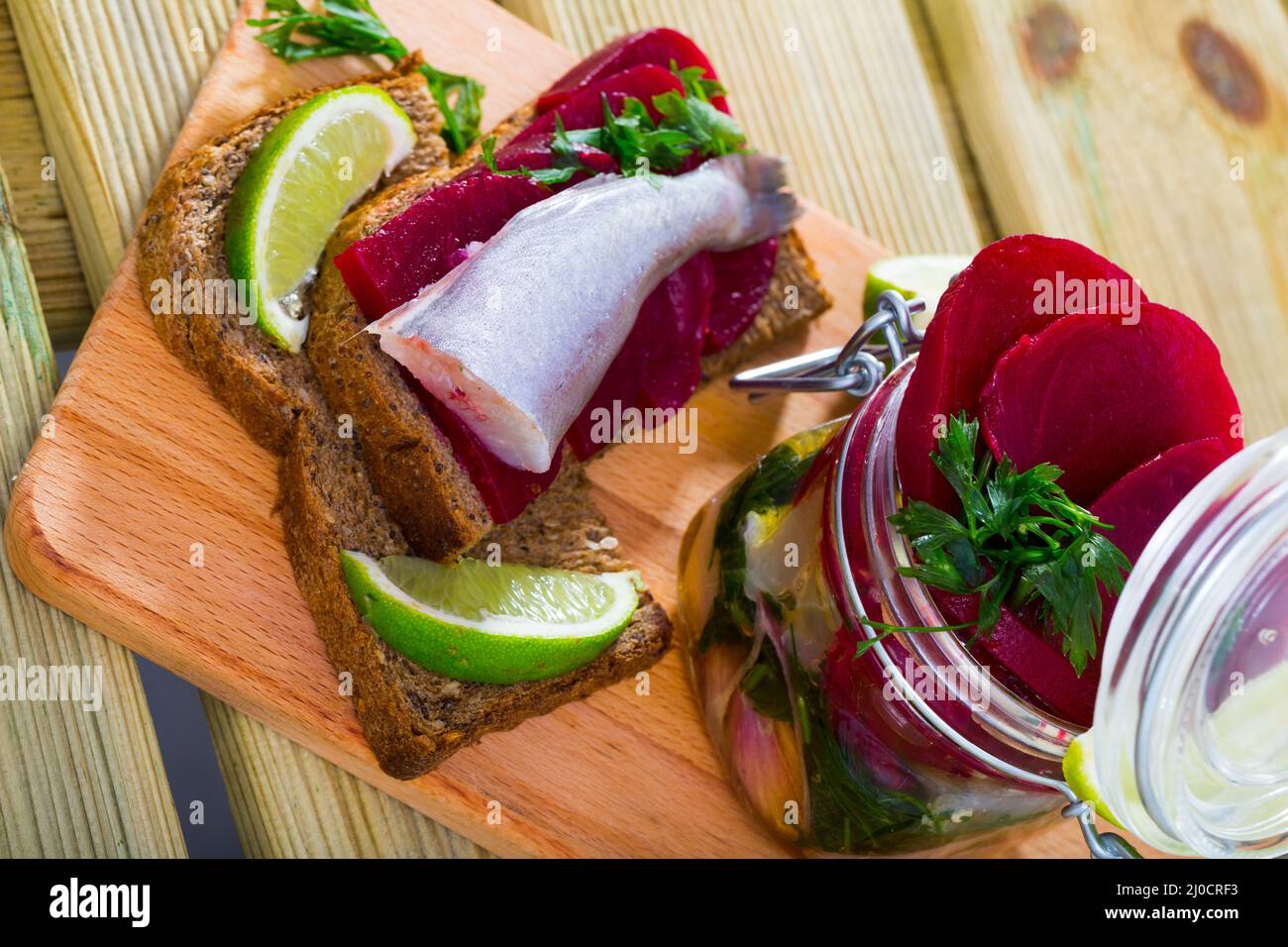 Homemade pickled blue whiting fish Stock Photo - Alamy