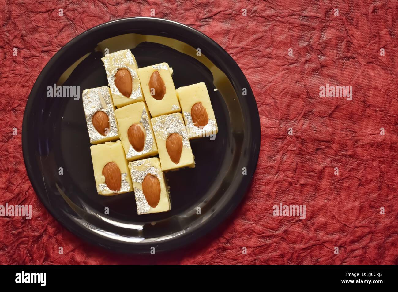 A Selective focus Flatlay top view Picture of an Indian Milk sweet ...