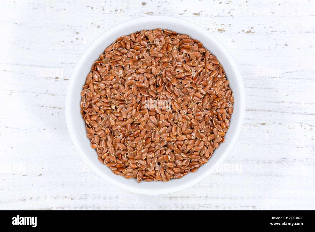Flax seed linseed from above wooden board Stock Photo - Alamy