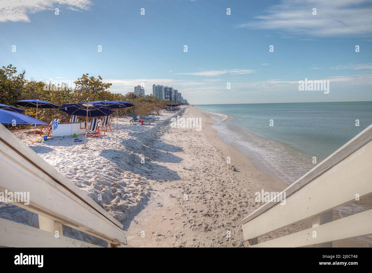 White sand beach and aqua blue water of Clam Pass in Naples, Florida ...