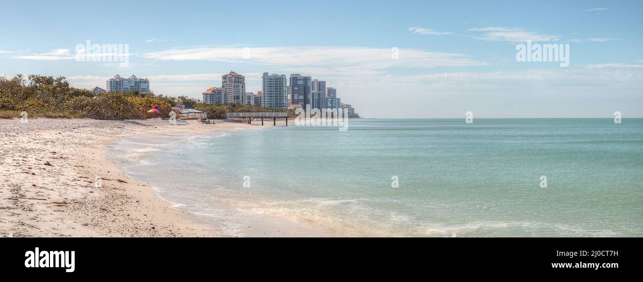 White sand beach and aqua blue water of Clam Pass in Naples, Florida ...