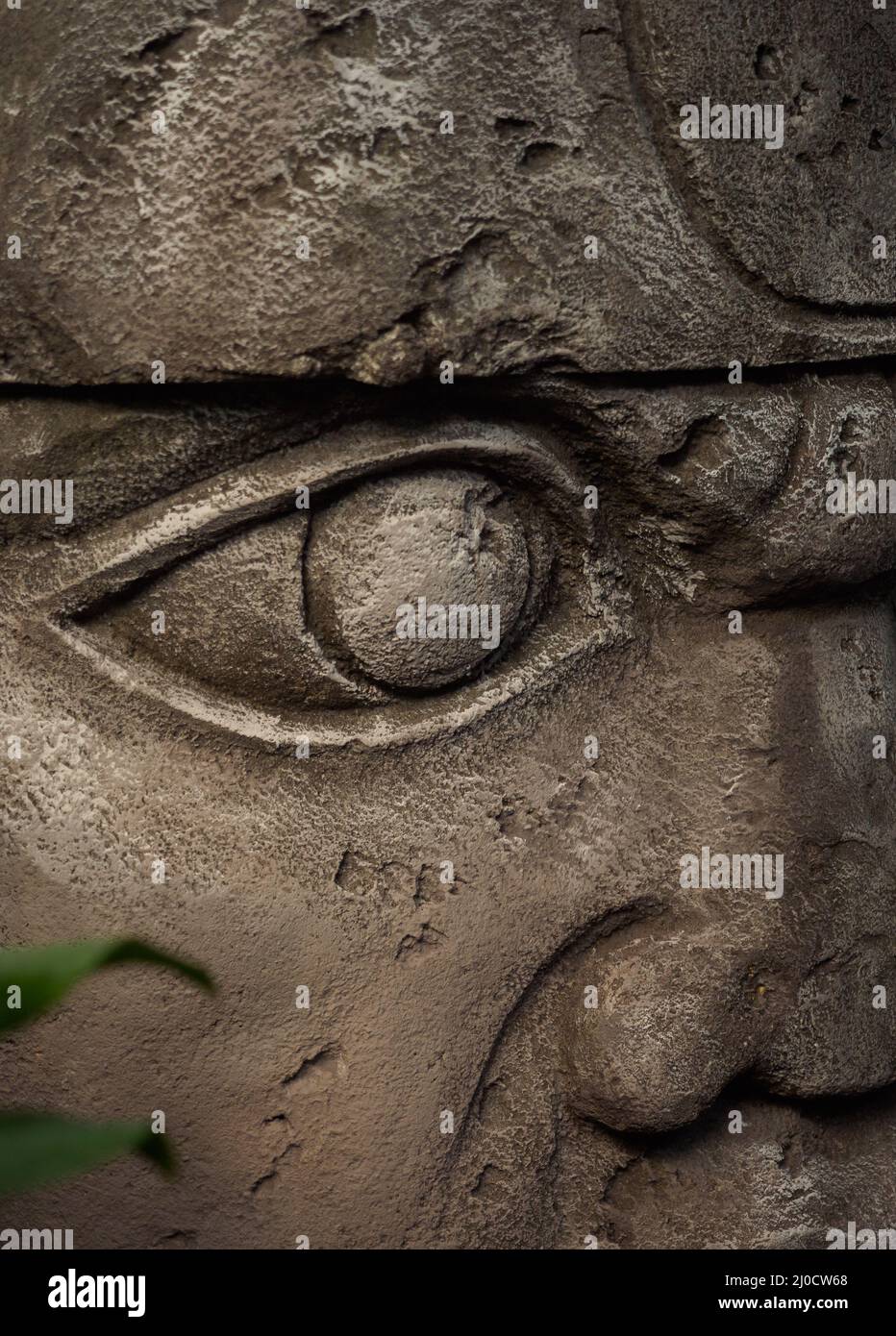 Olmec sculpture carved from stone. Mayan symbol - Big stone head statue ...