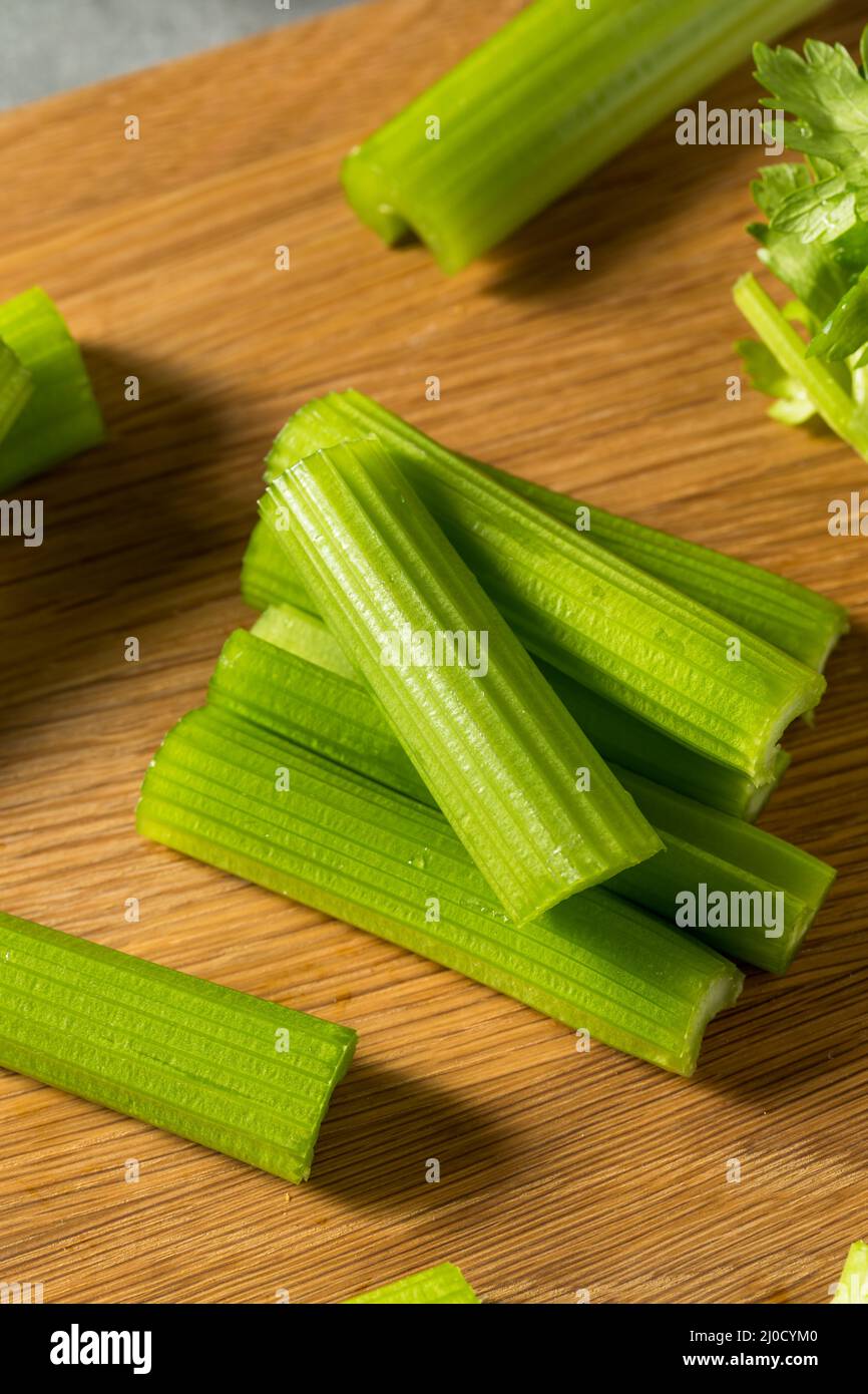Raw Green Organic Celery Stalks in a Bunch Stock Photo - Alamy