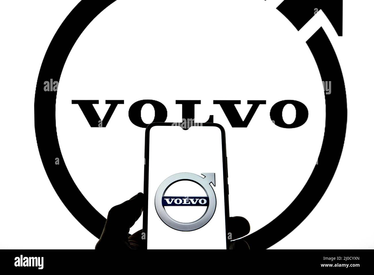 In this photo illustration a Volvo logo seen displayed on a smartphone ...