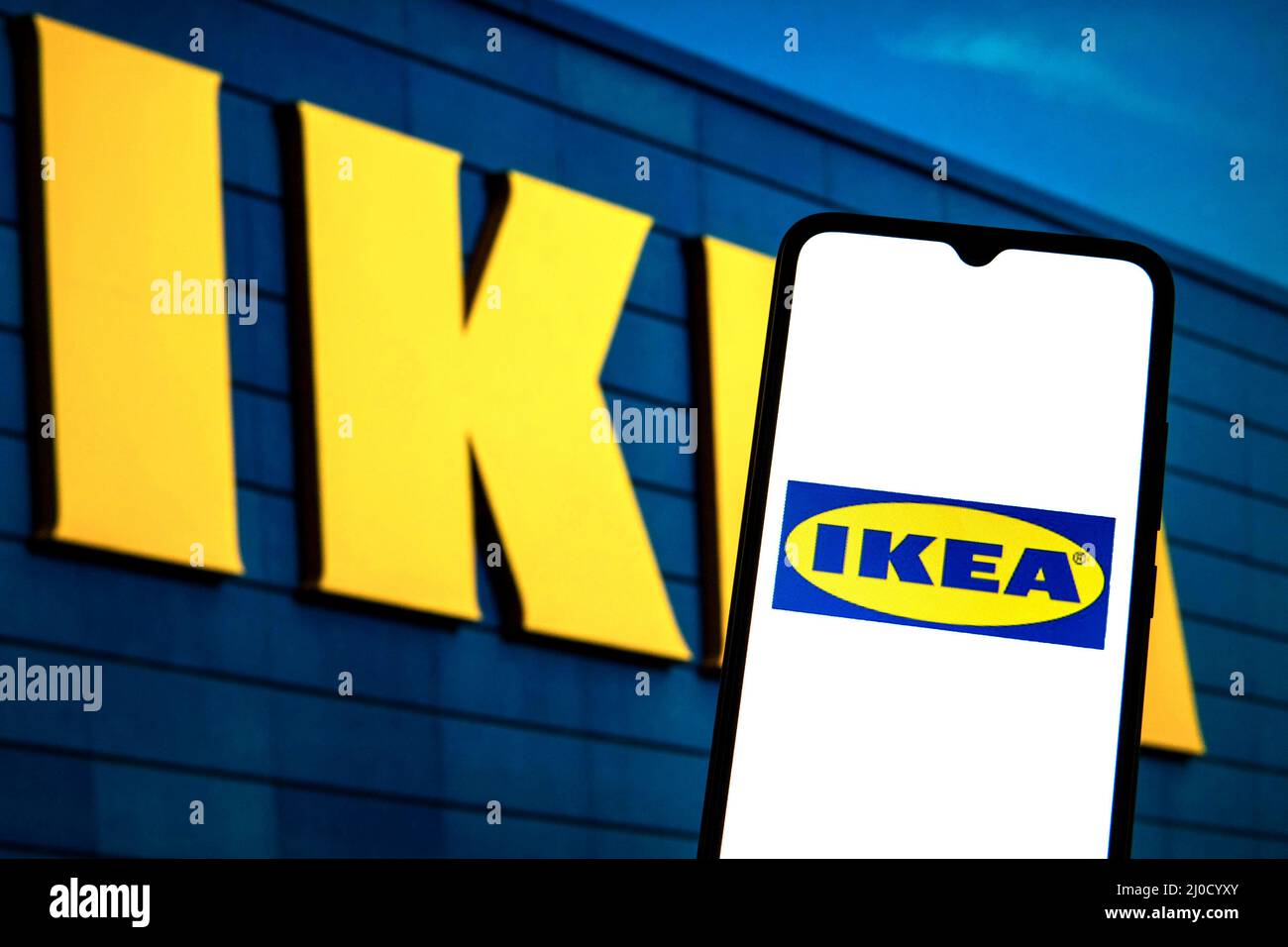 In this photo illustration the Ikea logo seen displayed on a smartphone ...