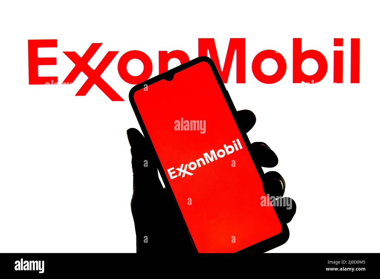 In this photo illustration the ExxonMobil Corporation logo seen ...