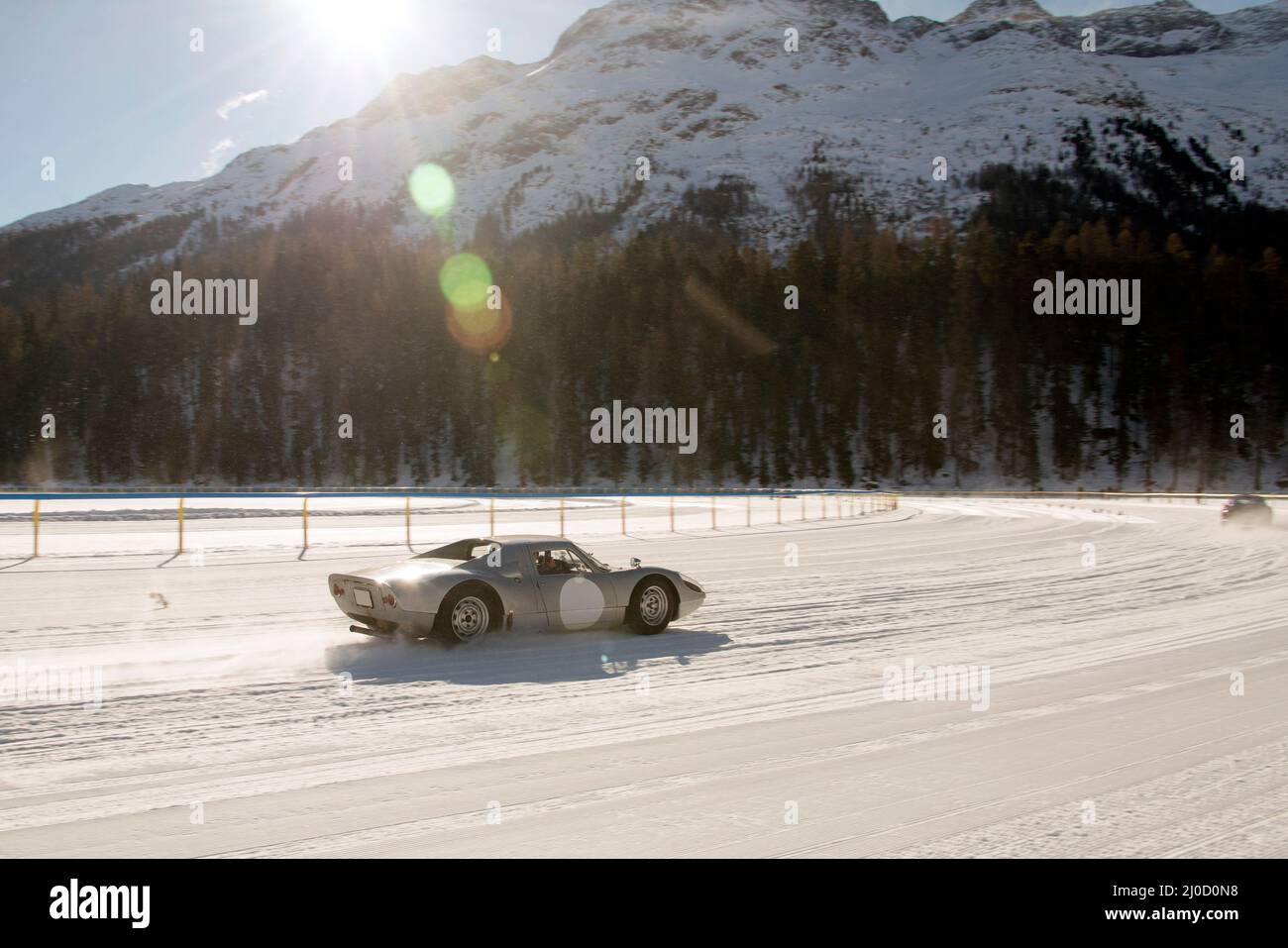 Classic vintage antique sports cars racing on the frozen lake of St ...