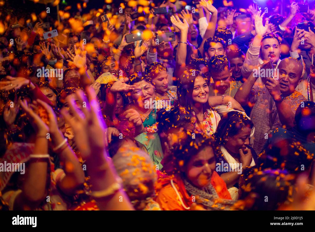 Kathmandu, Nepal. 18th Mar, 2022. Devotees sing and dance to celebrate ...