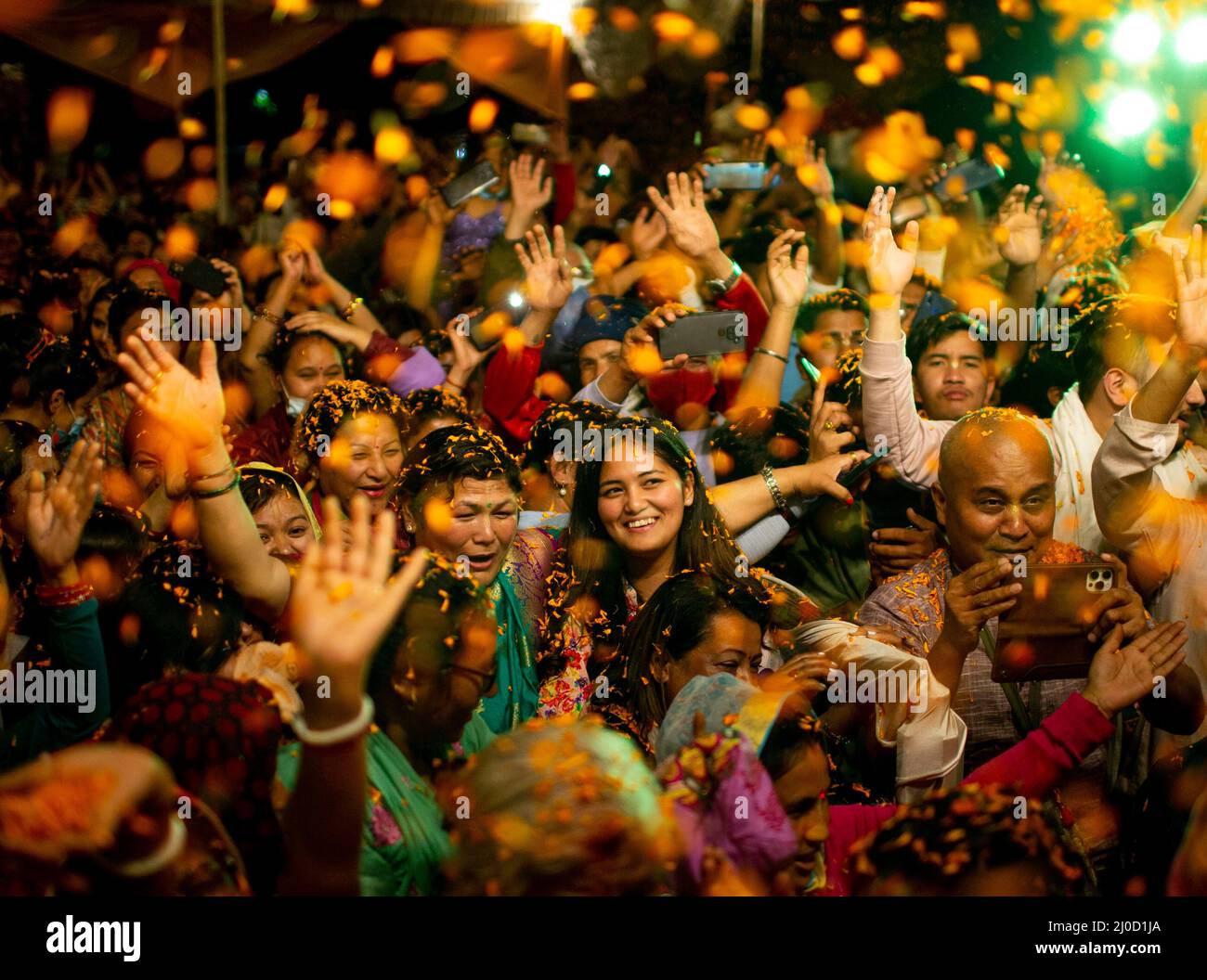 Kathmandu, Nepal. 18th Mar, 2022. Devotees sing and dance to celebrate ...