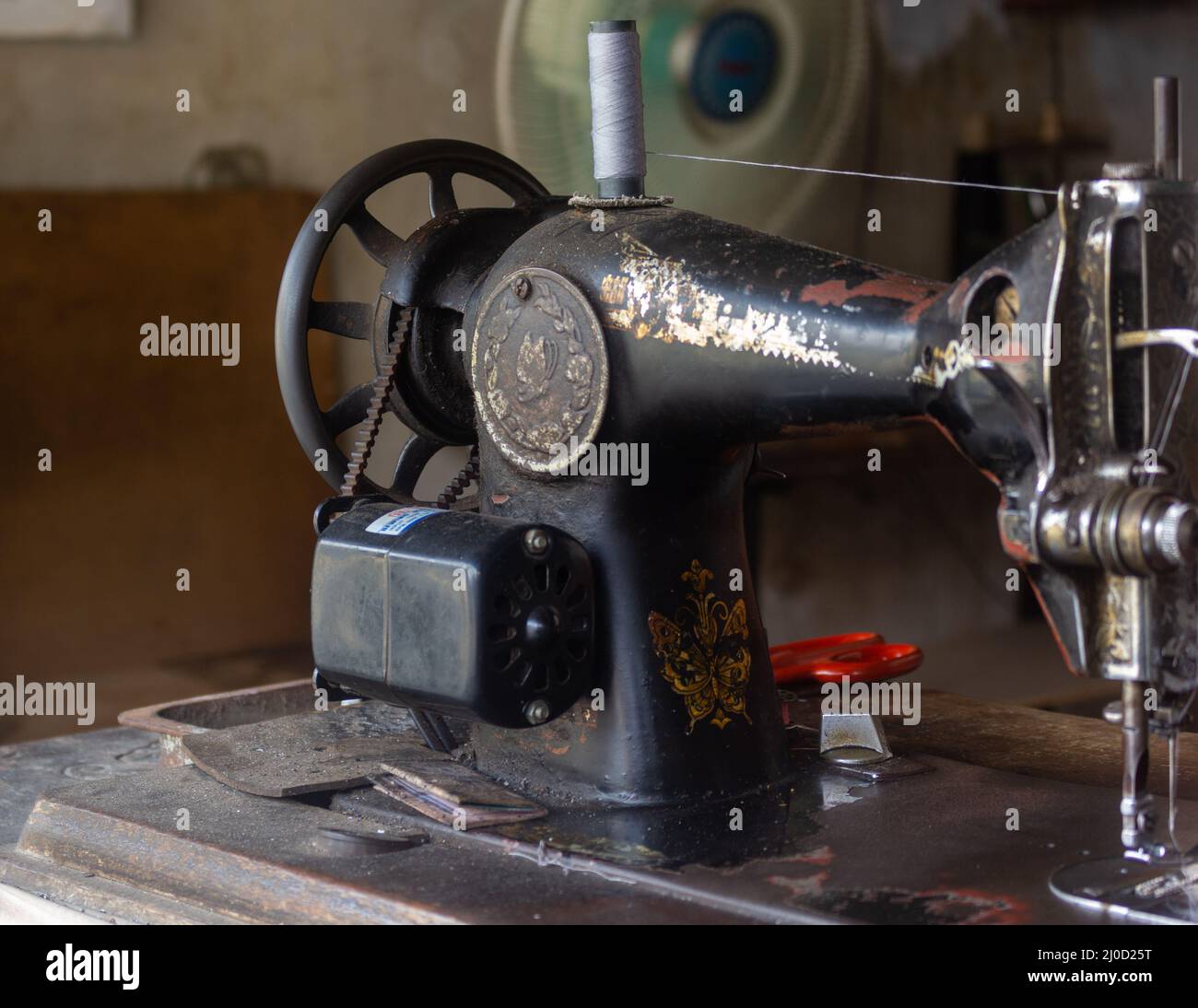 Vintage sewing machine on the table in Jakarta, Indonesia Stock Photo ...
