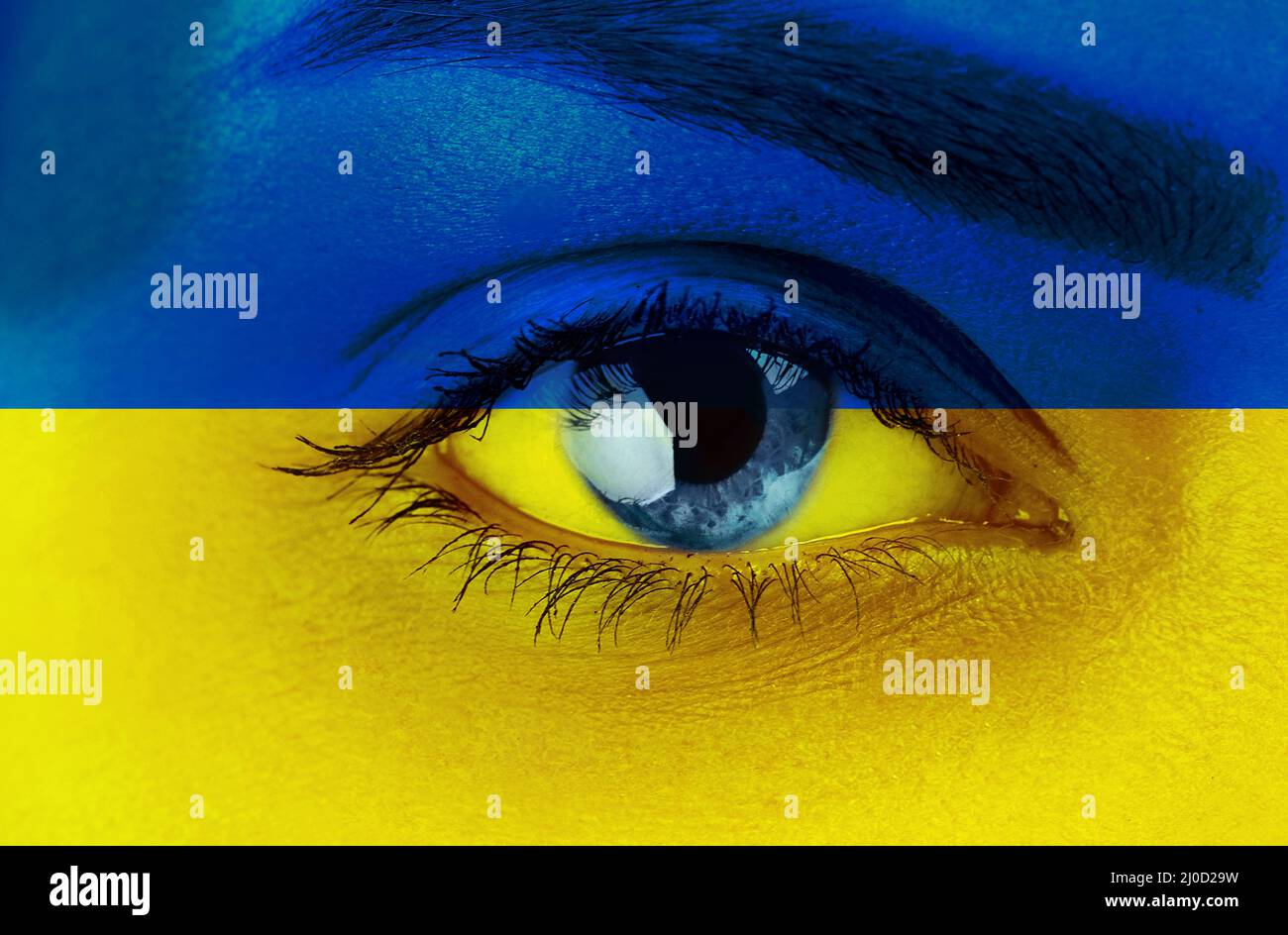 Woman face in ukraine flag colors. Ukraine flag painted over female ...