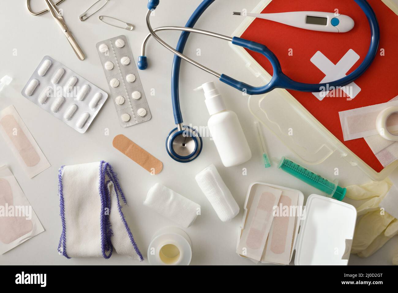 Assortment of basic first aid portable medical assistance equipment on ...