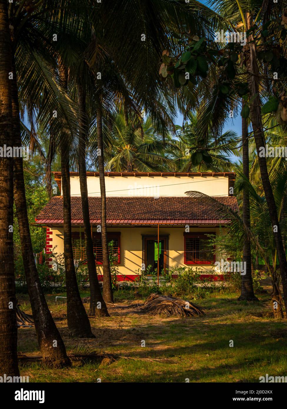 Indian house with traditional roof design at coastal side of ...