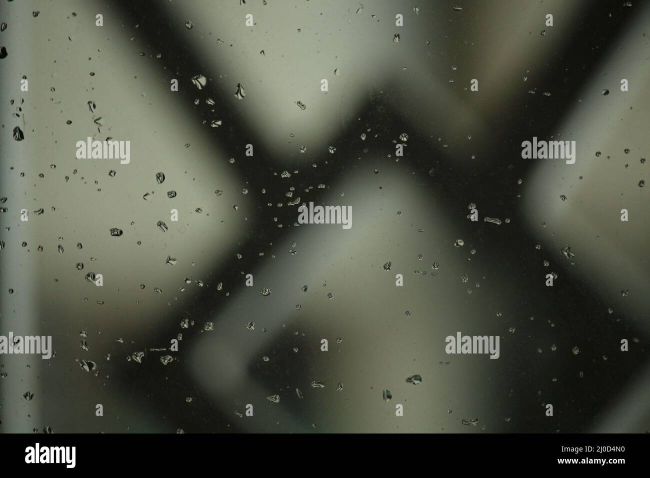 Rain water has fallen on the window glass Stock Photo - Alamy