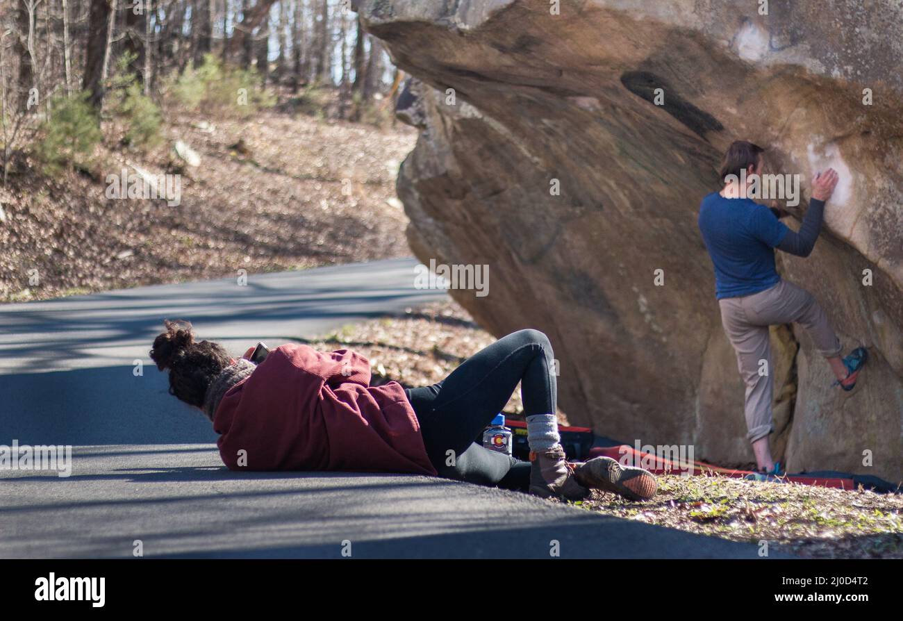 Male rock climber starting climb hi-res stock photography and images ...