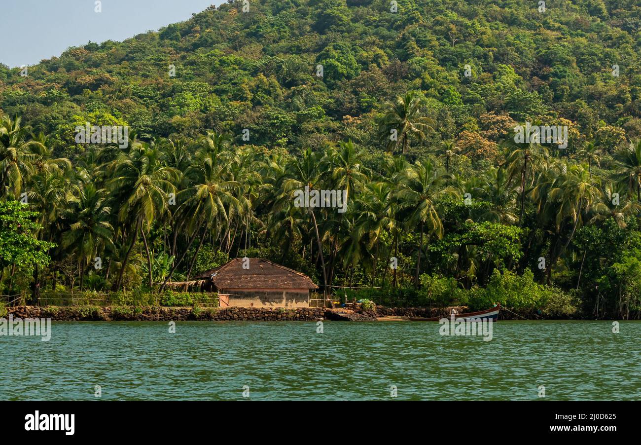 Indian house with traditional roof design at beach side of Maharashtra ...