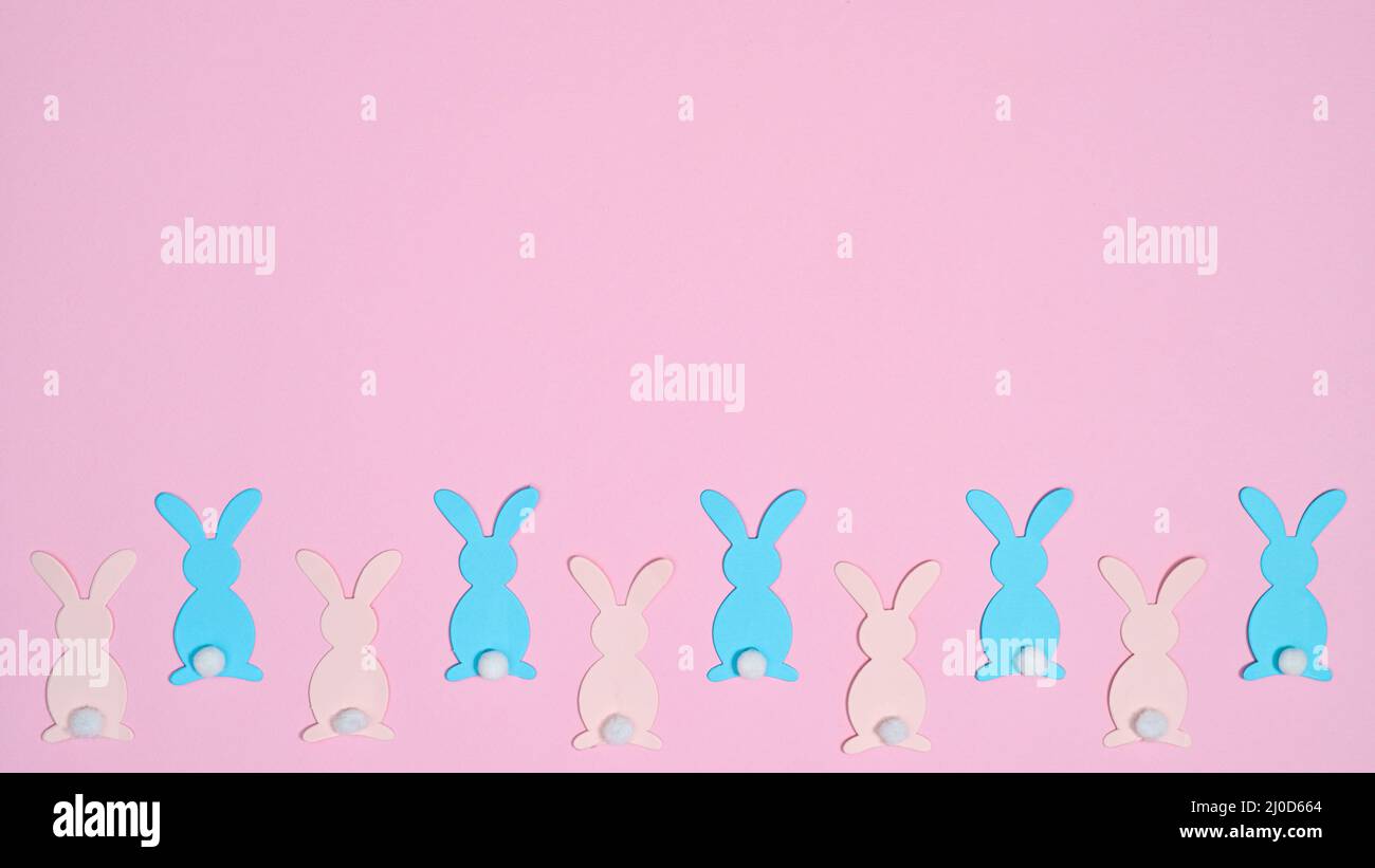 Pastel pink and blue rabbits on pastel pink background. Creative copy ...