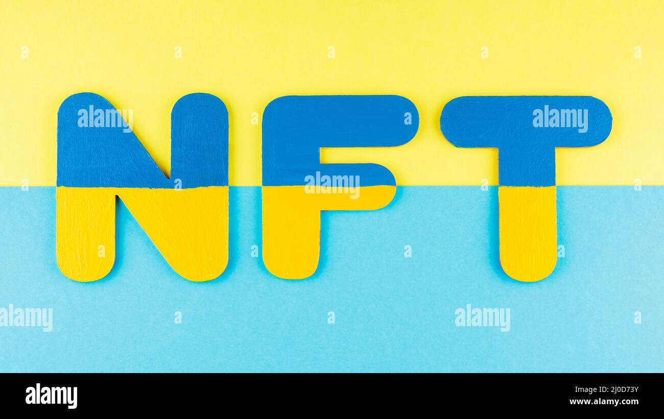 Nft Inscription On A Blue Yellow Background Non Fungible Token In