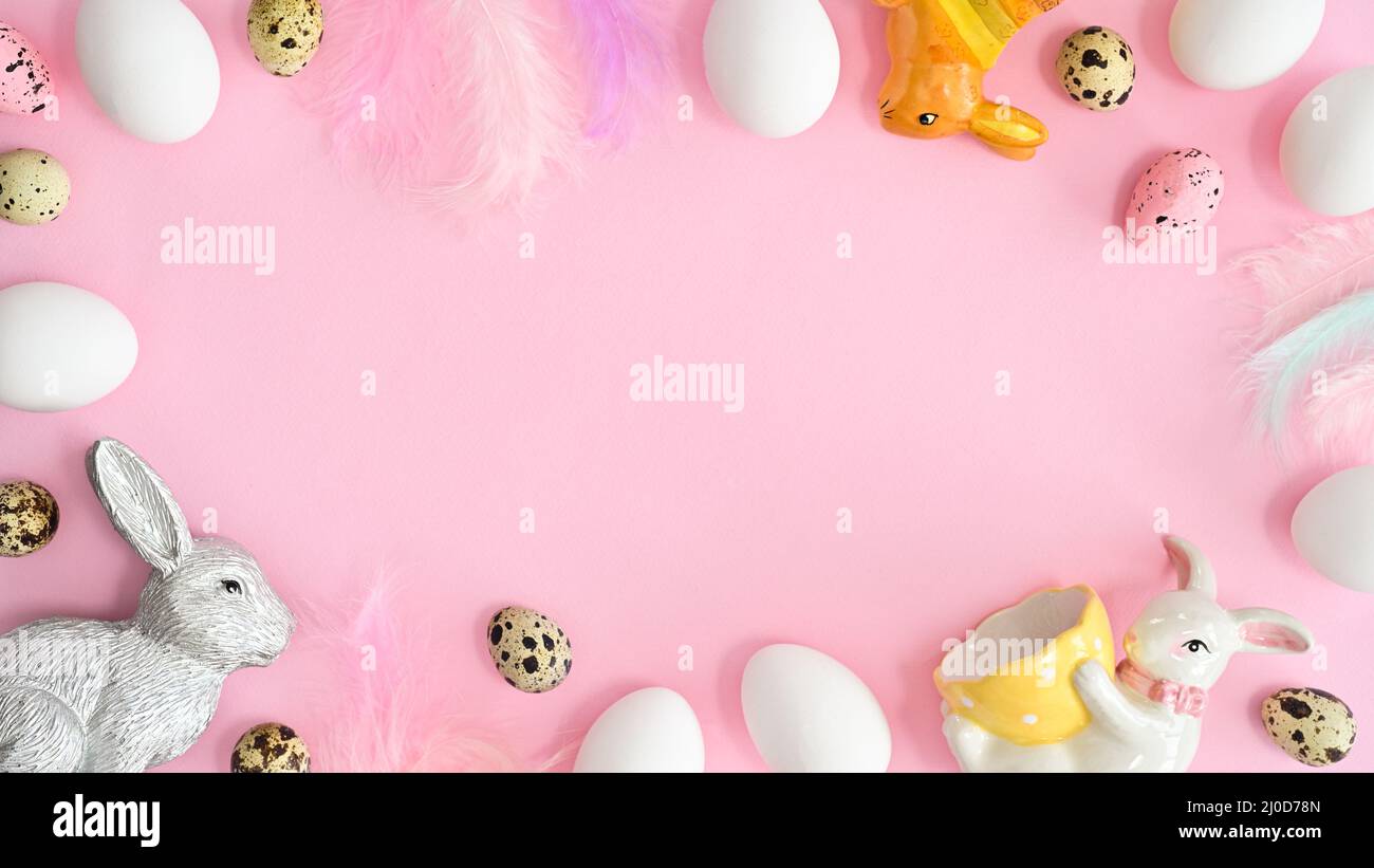 Easter frame with copy space on pastel pink background with Easter ...