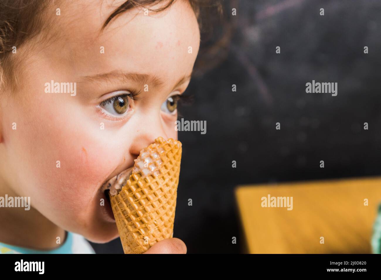 A baby eating a ice cream Stock Photo - Alamy