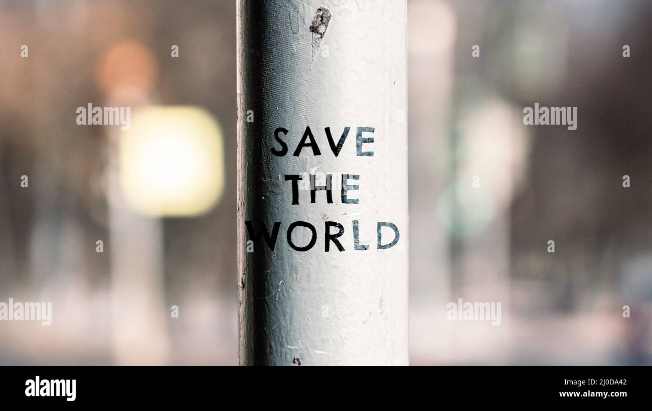 The inscription on the pillar save the world. The inscription on the ...