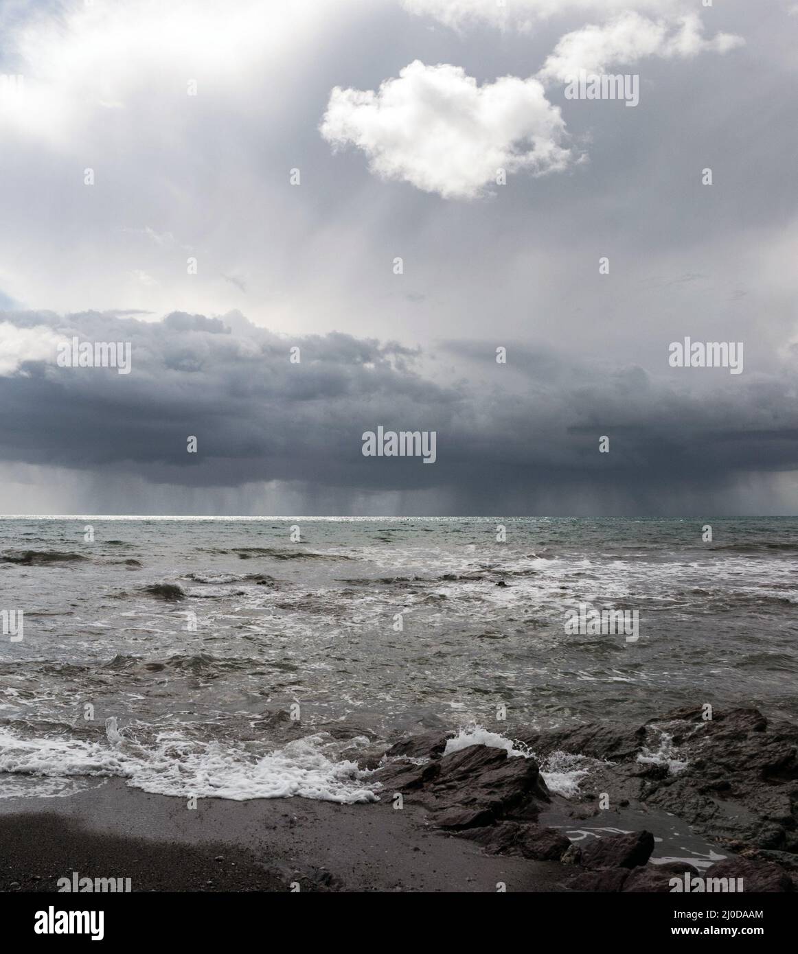 UK, English Channel. Bright cloud, rain or storm approaching over, the ...