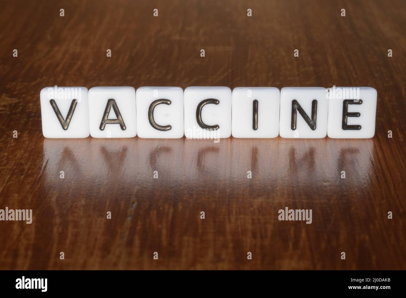 Vaccine word written on blocks. Isolated Stock Photo - Alamy