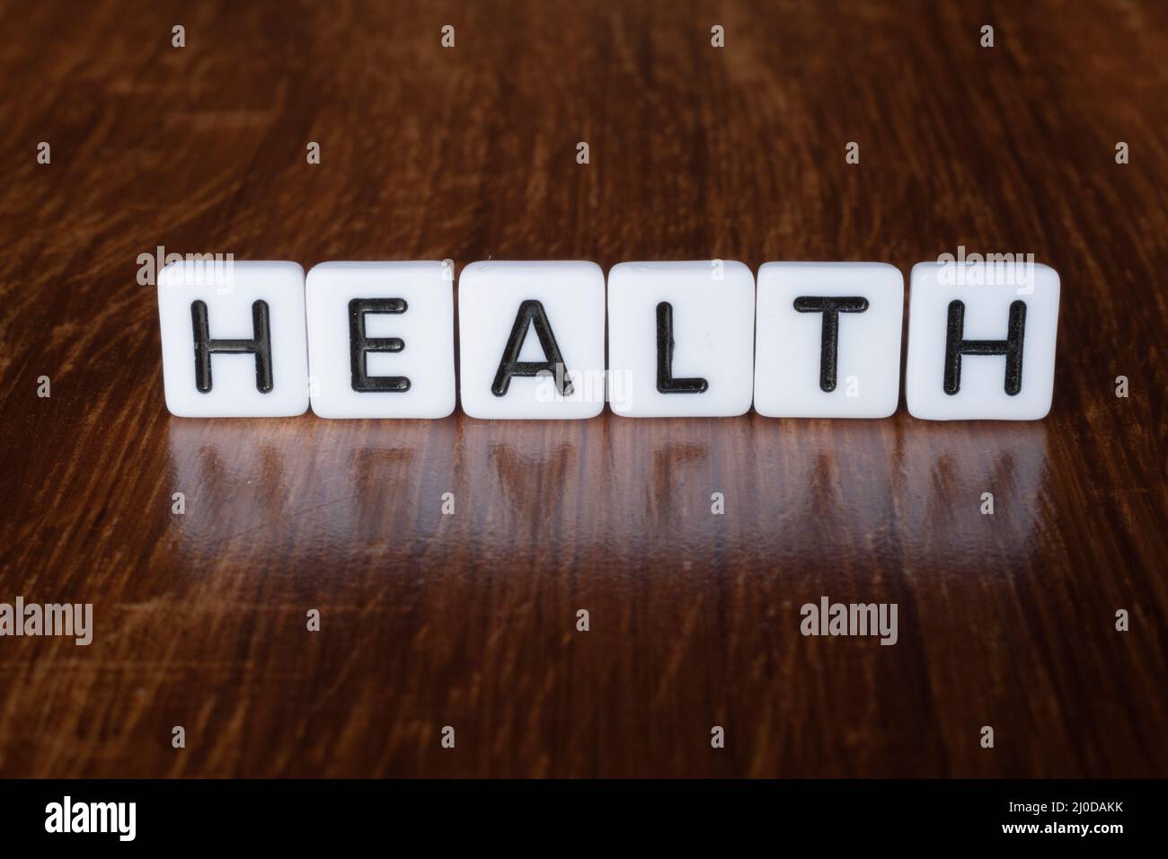 Health idea concept. Health word written on blocks. Isolated Stock ...
