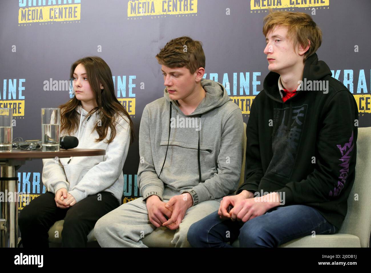 KYIV, UKRAINE - MARCH 18, 2022 - Oleksandr Sikorskyi (R) and his friends Andrii Kolisnyk and ...
