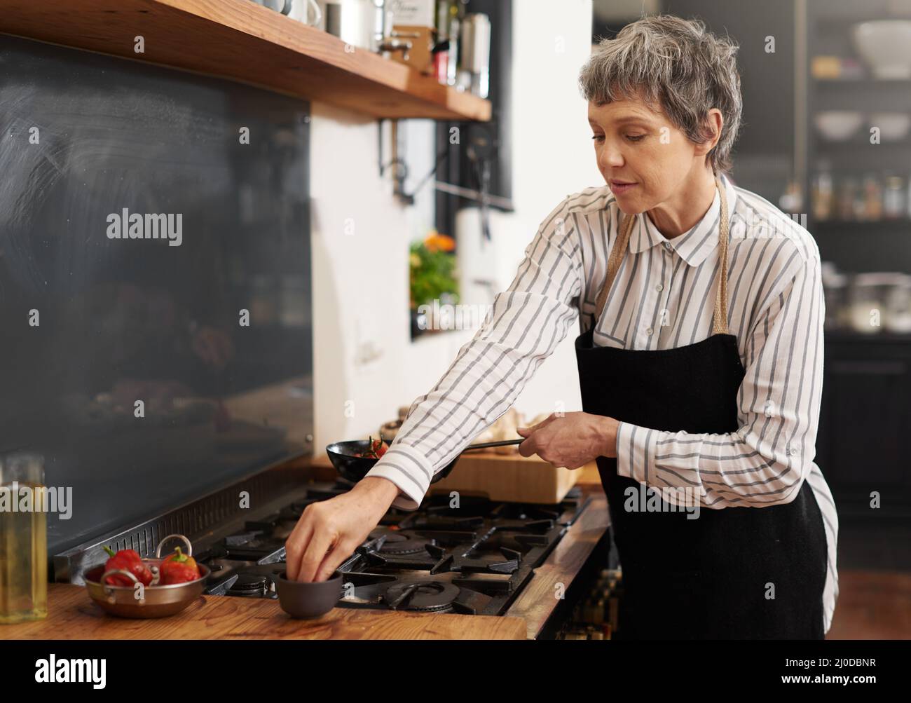 Cropped shot woman cooking kitchen hi-res stock photography and images ...