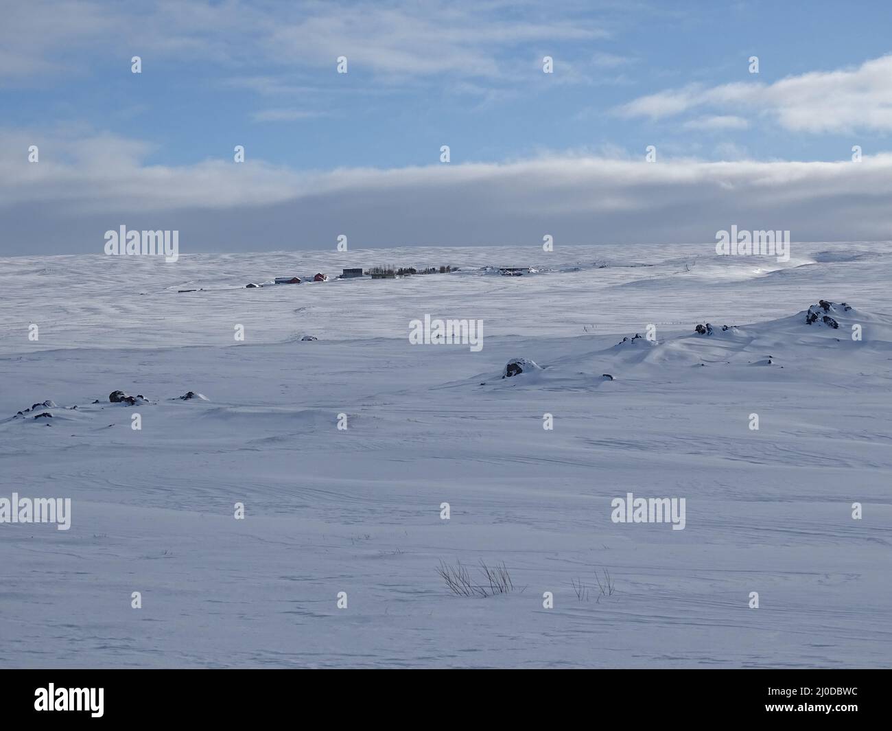 Landscape view of the snowcapped houses in the distance Stock Photo - Alamy