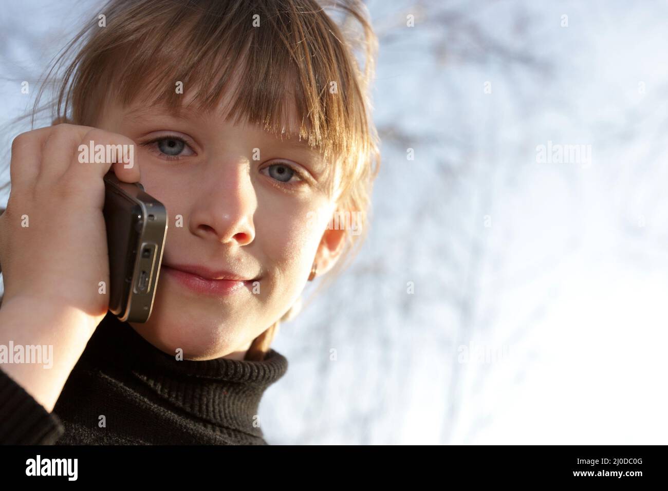 The girl calls her mother from a forest Stock Photo - Alamy