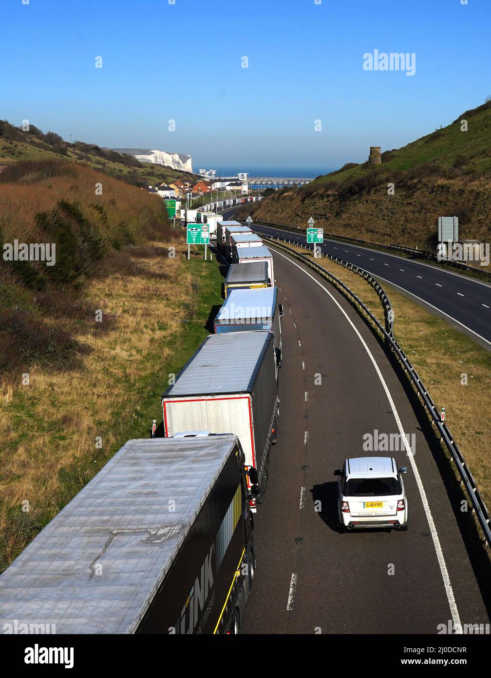Lorries queue for the Port of Dover after P&O Ferries suspended ...