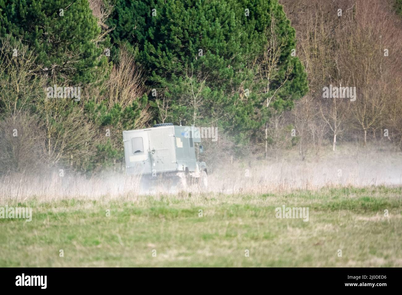 British army Land Rover Defender Wolf ambulance in action on a military ...