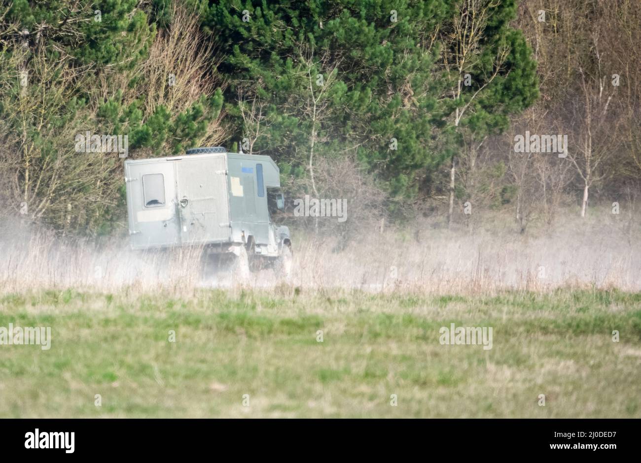 British army Land Rover Defender Wolf ambulance in action on a military ...