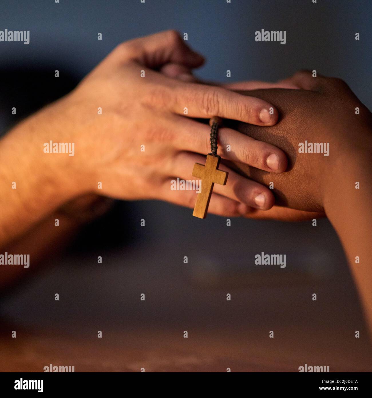Two people praying together hi-res stock photography and images - Alamy