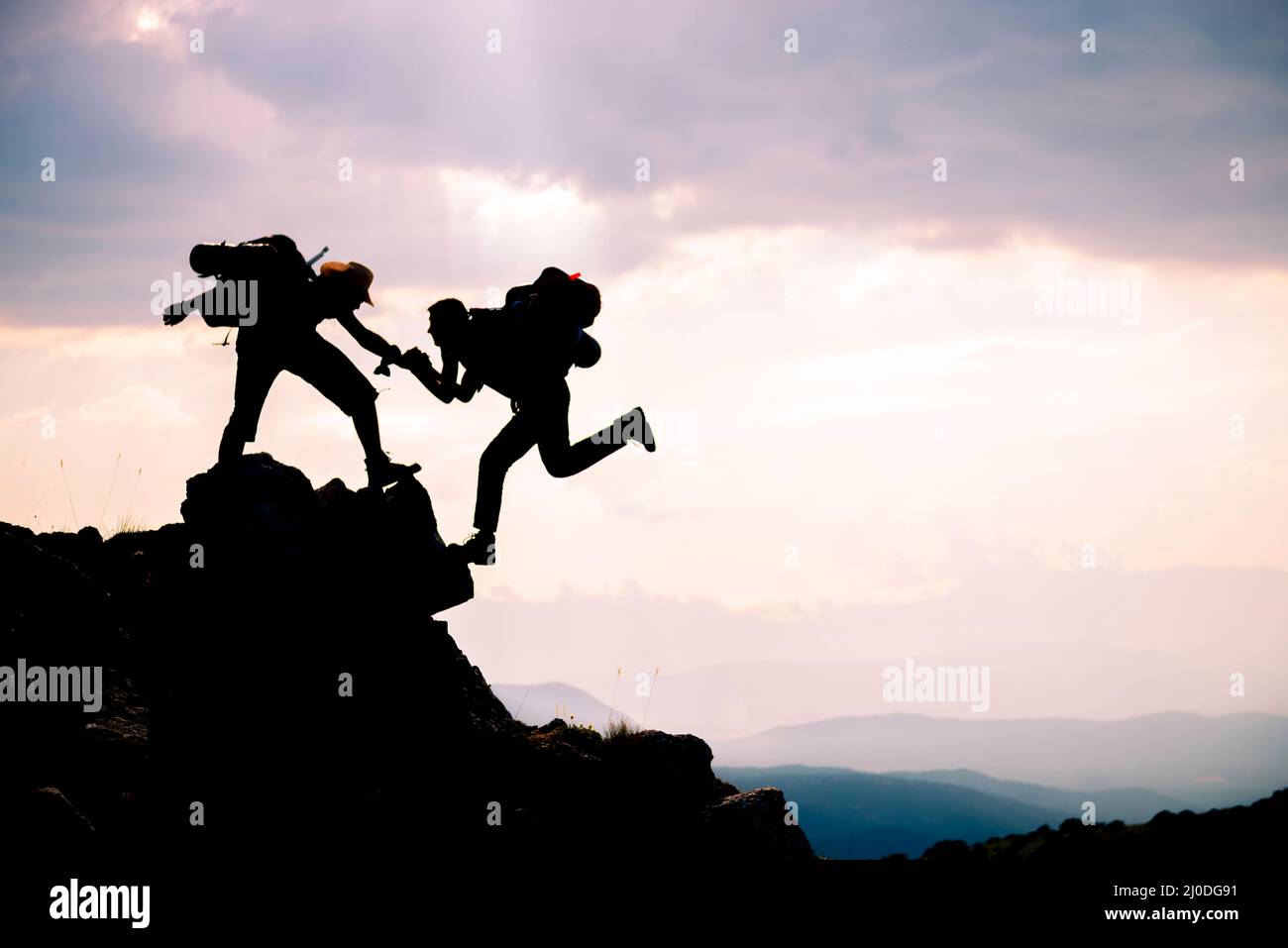 Mountain climbing help hand hi-res stock photography and images - Alamy